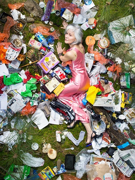Photo series of Americans lying in seven days worth of their own garbage
