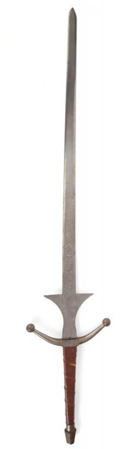 A beam in the shade from a silvery blade: Own Ronnie James Dio’s sword ...